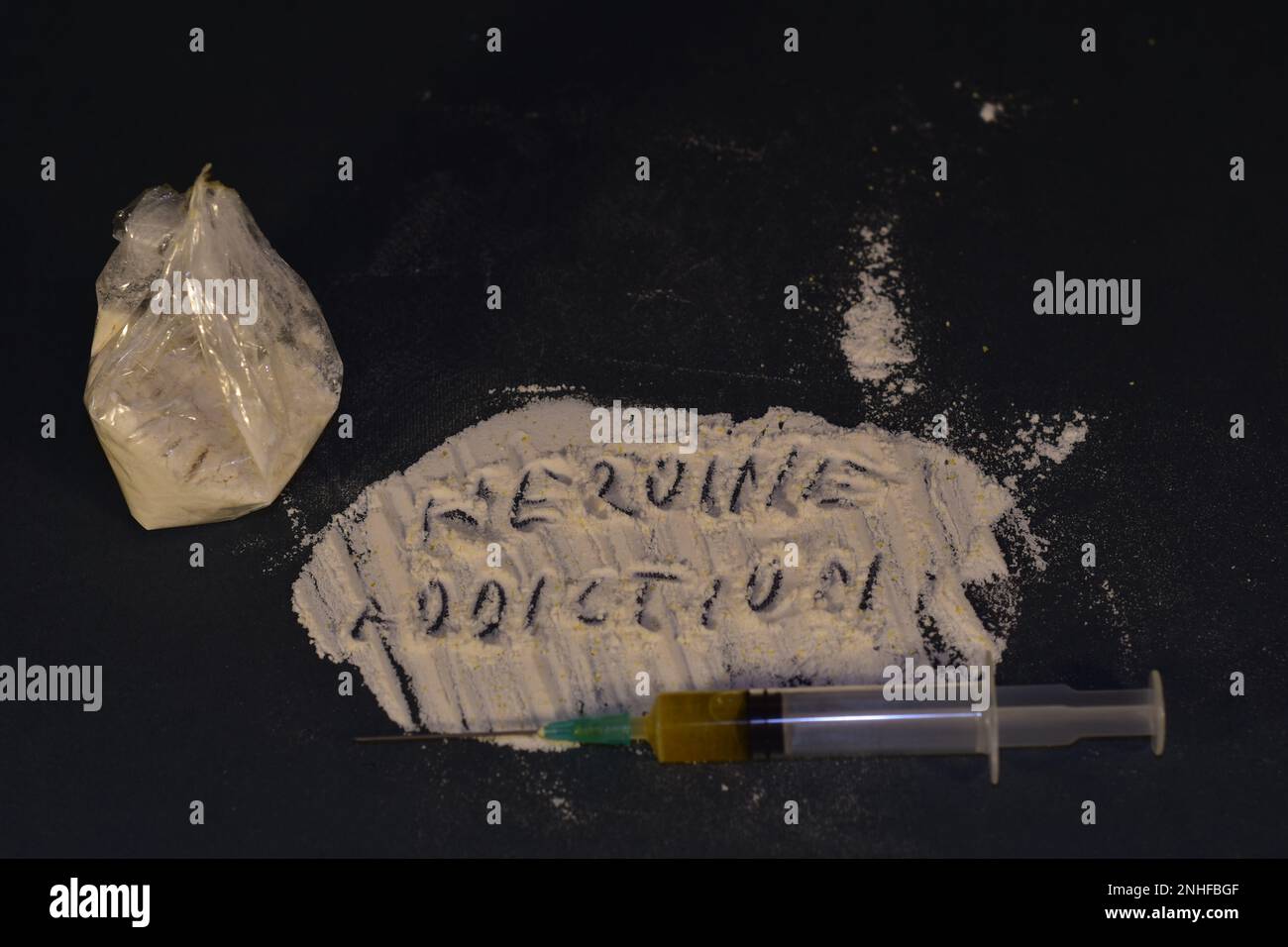 Addiction concept drugs white powder and syringe with needle Stock ...