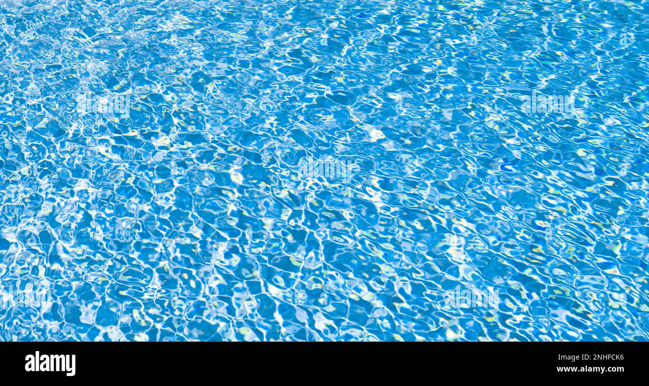 rippled water blue color in summer swimming pool Stock Photo - Alamy