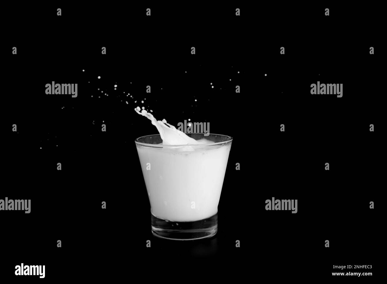 Cream splashes Black and White Stock Photos & Images - Alamy