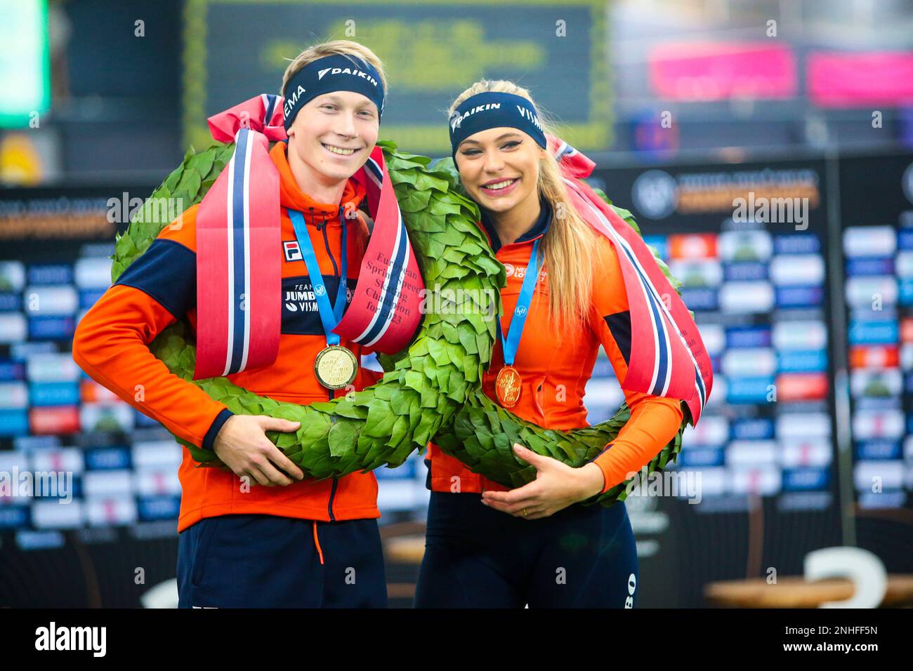 Merijn Scheperkamp and Jutta Leerdam, right, of the Netherlands celebrate winning the men's and ...