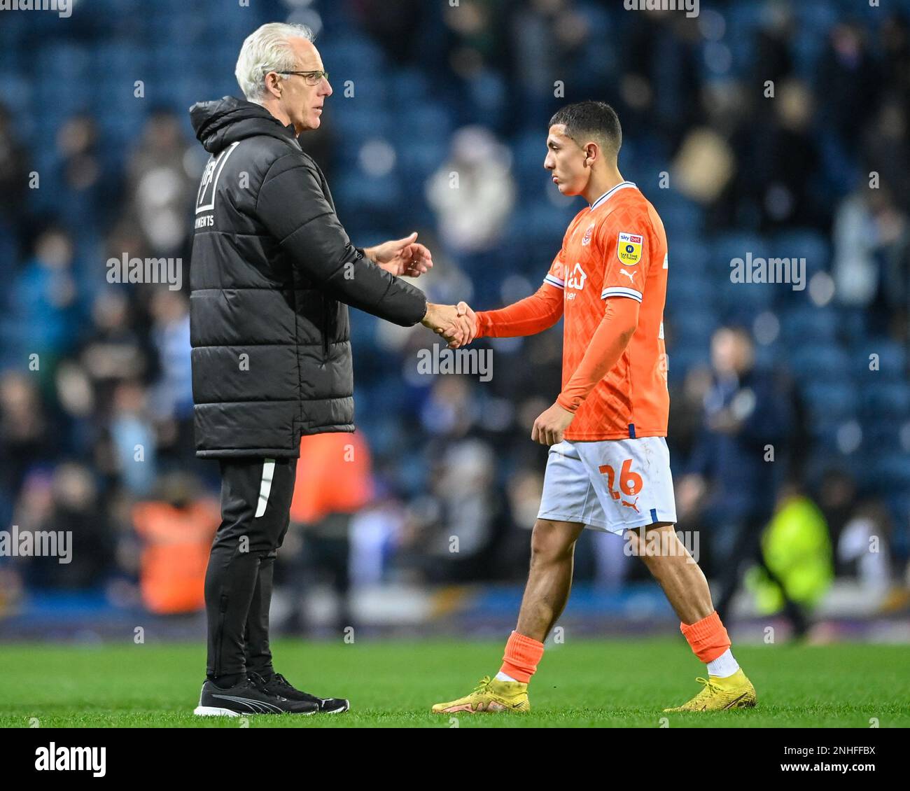 Mick McCarthy manager of Blackpool greeting Ian Poveda #26 of Blackpool ...