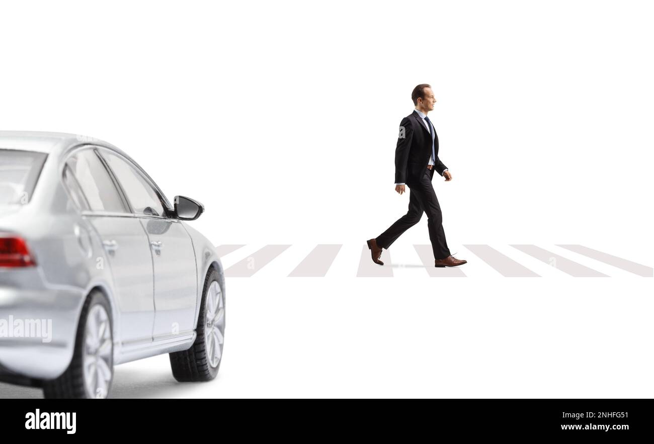 Car stopping at a pedestiran corssing and businessman walking isolated ...