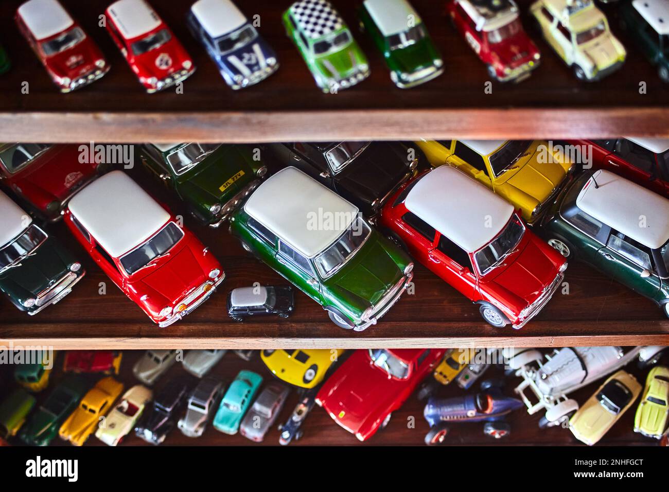 Miniature Mini Cooper cars on a wooden shelf Stock Photo - Alamy