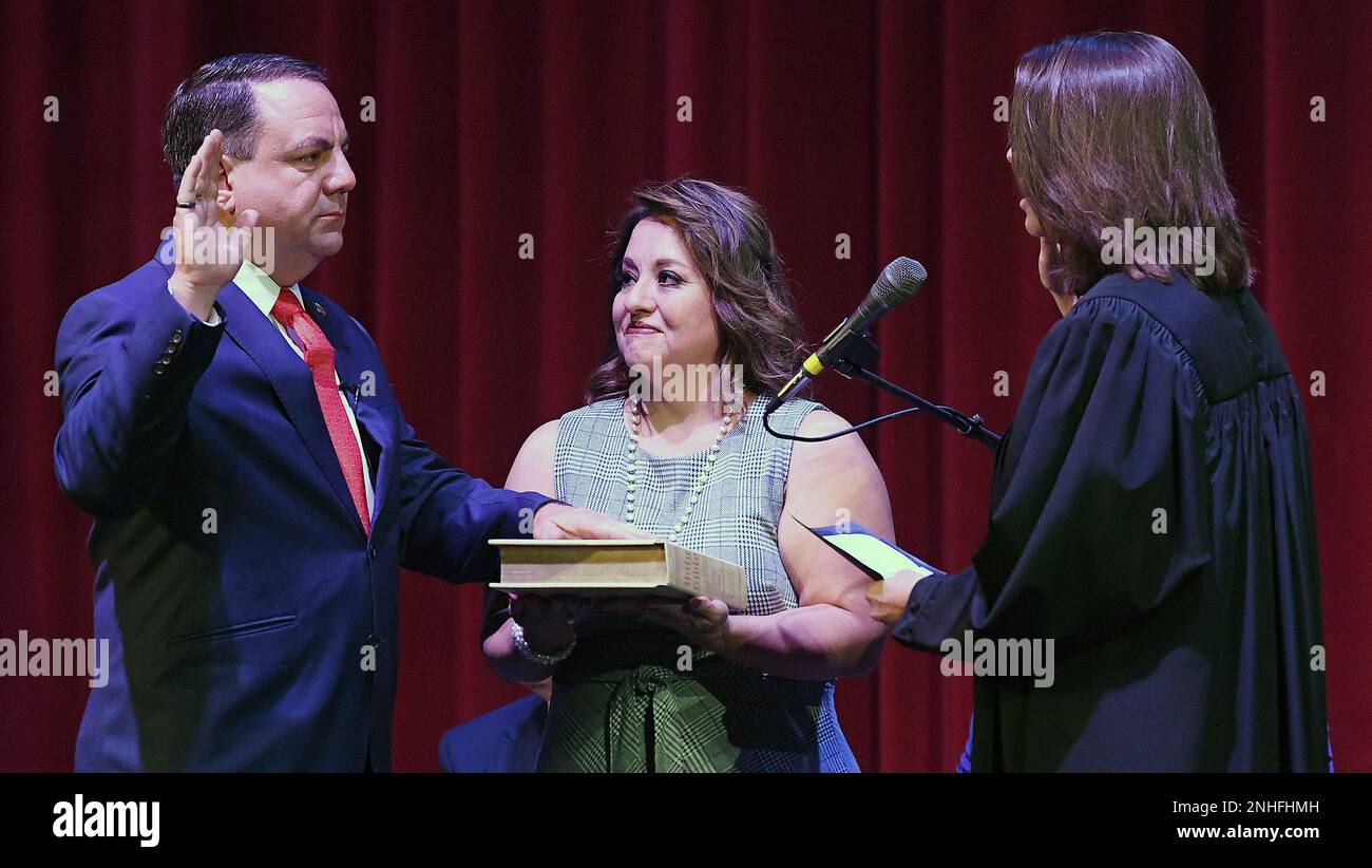 Re-elected Yuma Mayor Douglas Nicholls, left, is sworn into office for ...