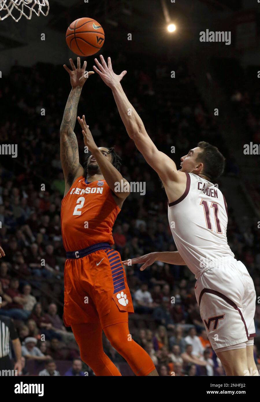 Clemson's Dillon Hunter (2) shoots past Virginia Tech's John Camden (11 ...