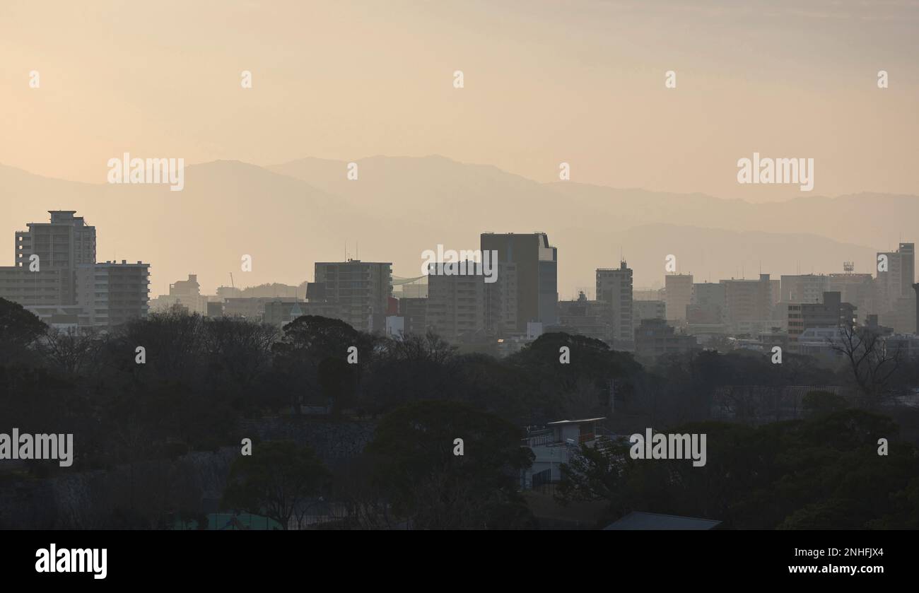 A photo shows yellow sand and air pollution covering the city of ...