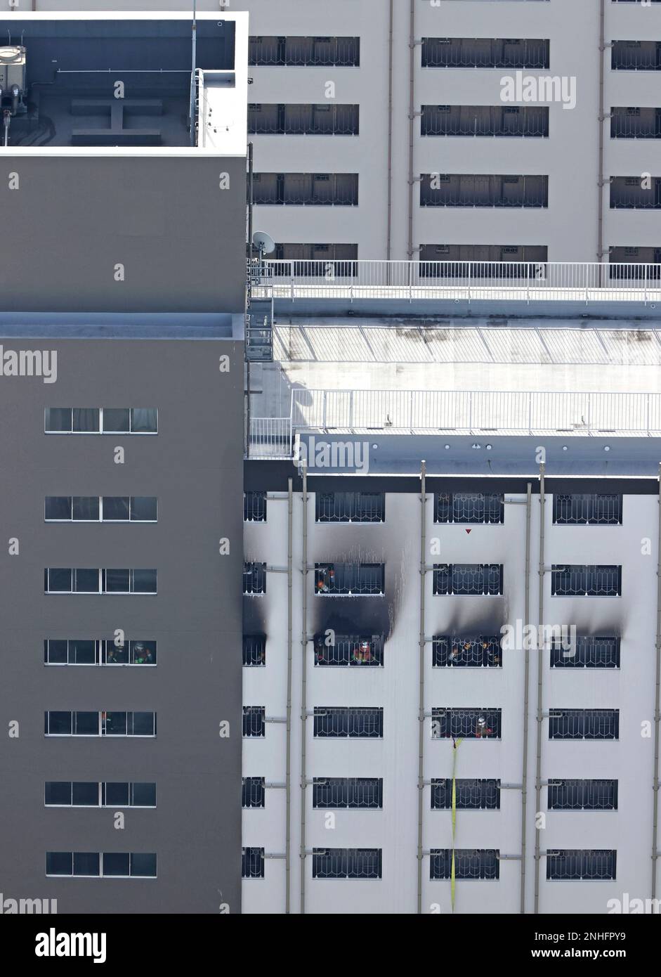 An aerial photo shows a fire site at an apartment complex in Itabashi ...
