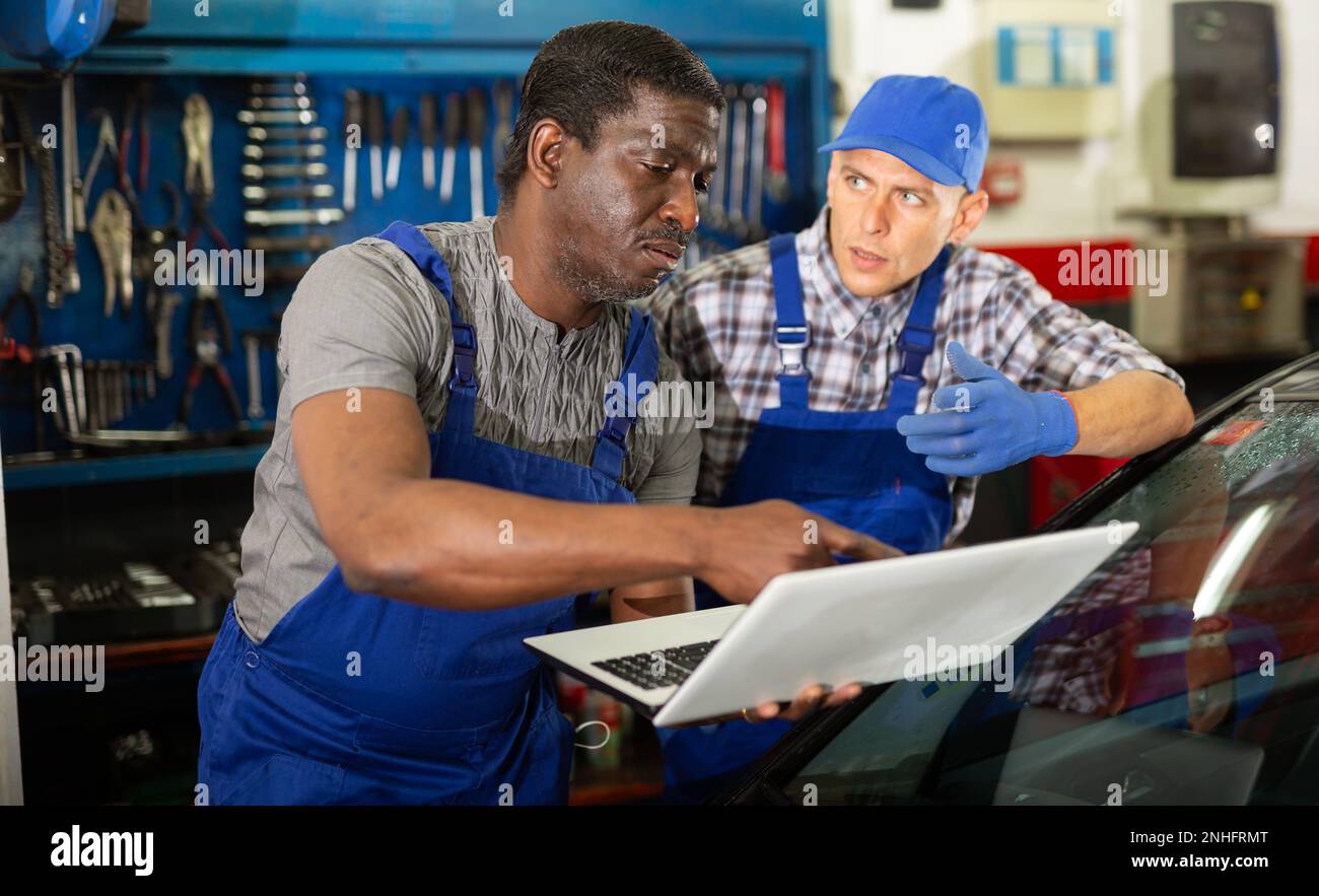 African american engineer examining computer hi-res stock photography ...