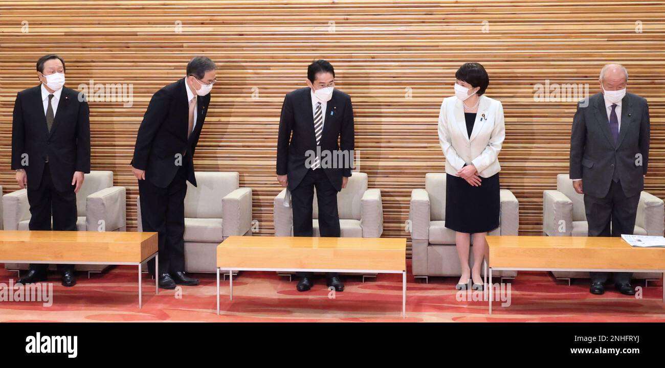 Japanese Prime Minister Fumio Kishida (C) attends a cabinet meeting at ...
