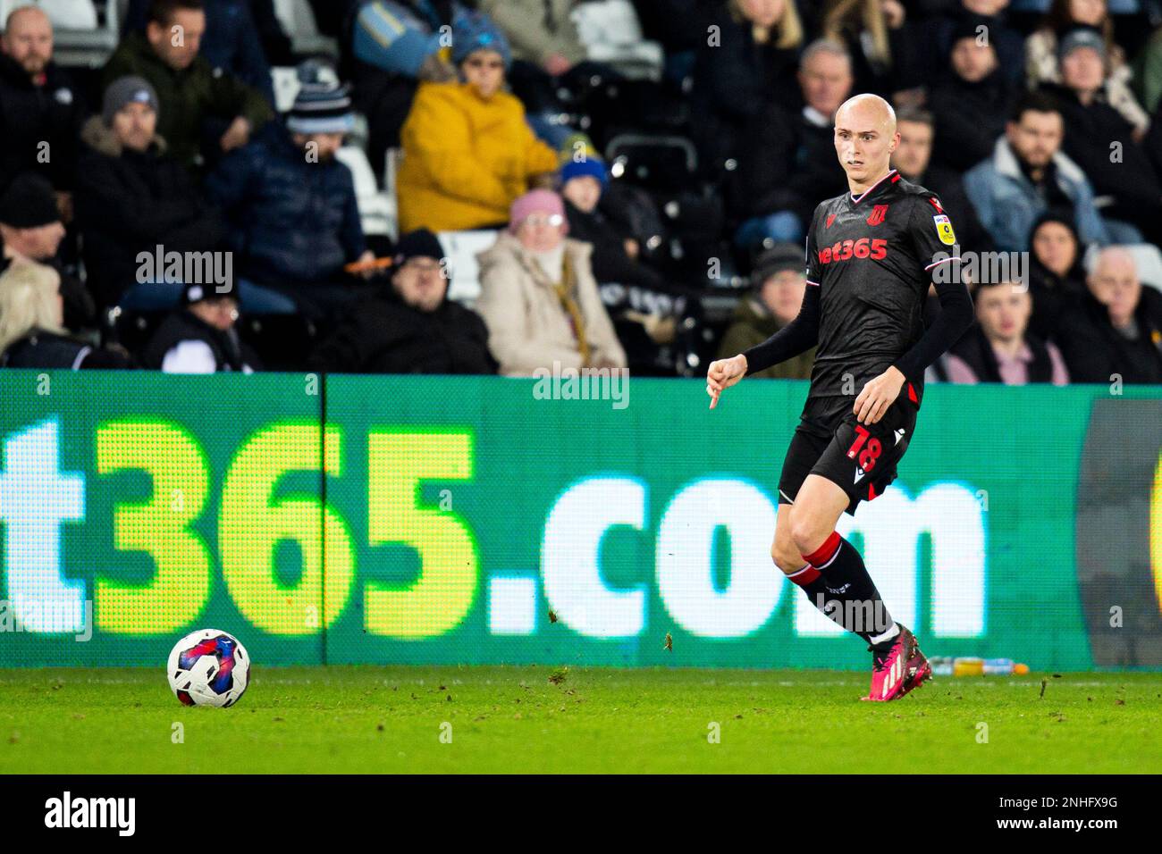 Swansea, UK. 21st Feb, 2023. Will Smallbone of Stoke City in action ...