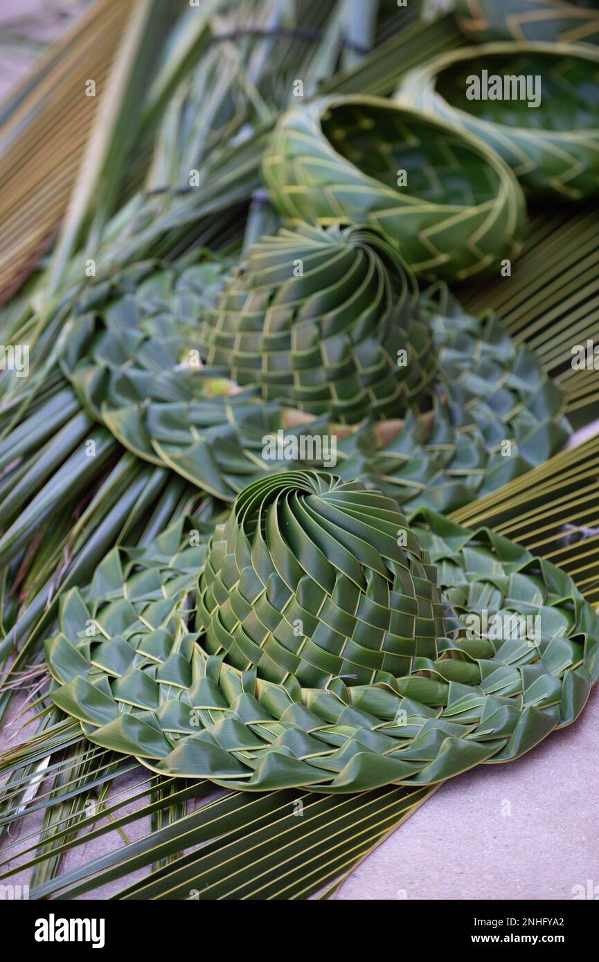 coconut wicker hat. coconut wicker hat green color. selective focus of ...