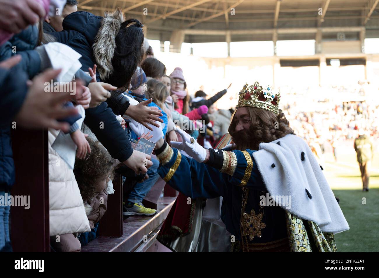 King Gaspar greets the children on his arrival in a helicopter of the ...