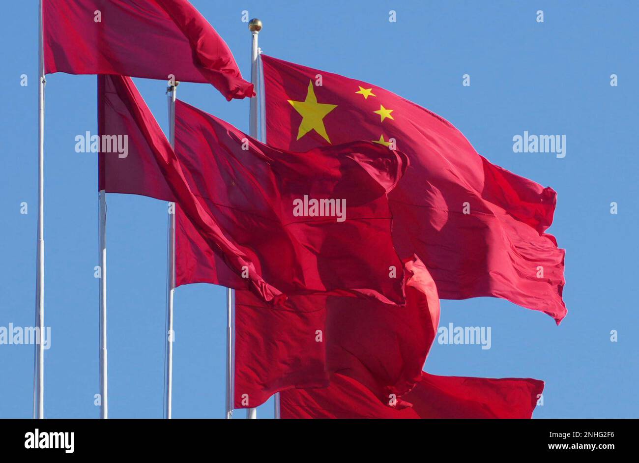 Chinese national flags and the red flags are streamed in the wind on ...