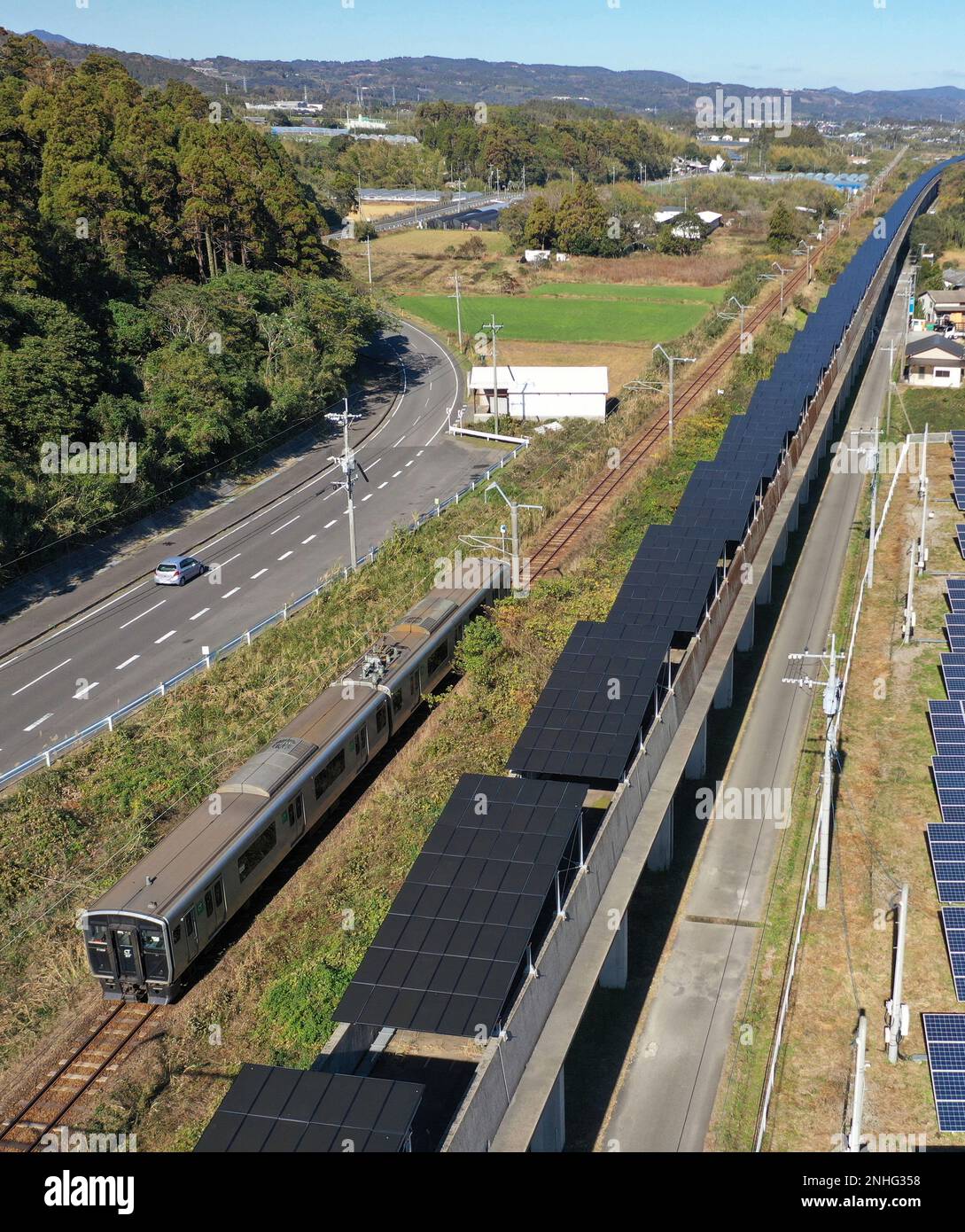 Solar panels are lined up on the viaduct of the former maglev (linear ...