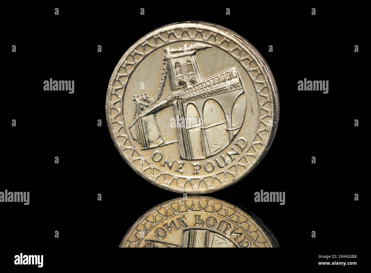 UK 2005 one pound coin featuring the Menai Suspension Bridge located in ...