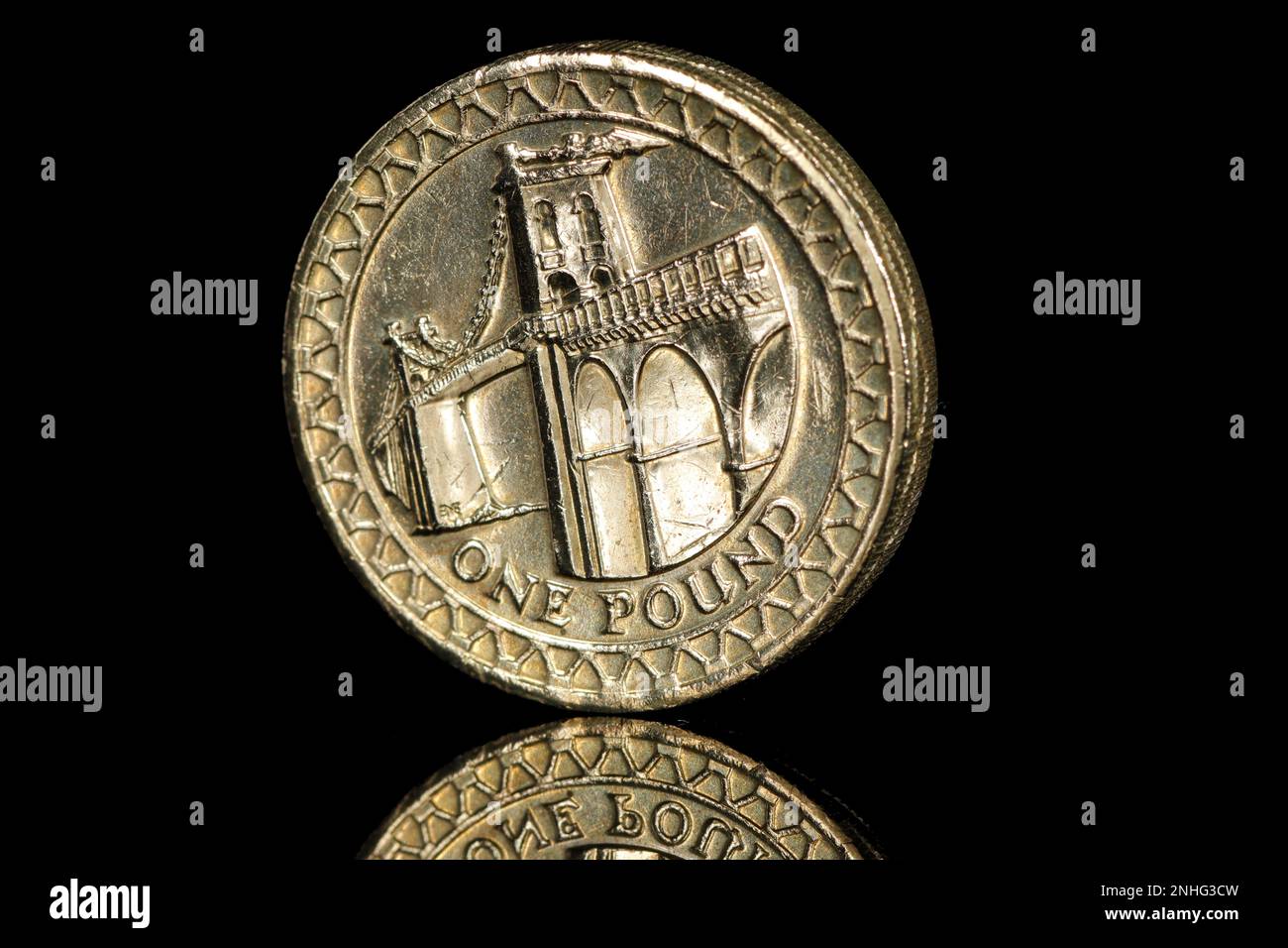 UK 2005 one pound coin featuring the Menai Suspension Bridge located in ...