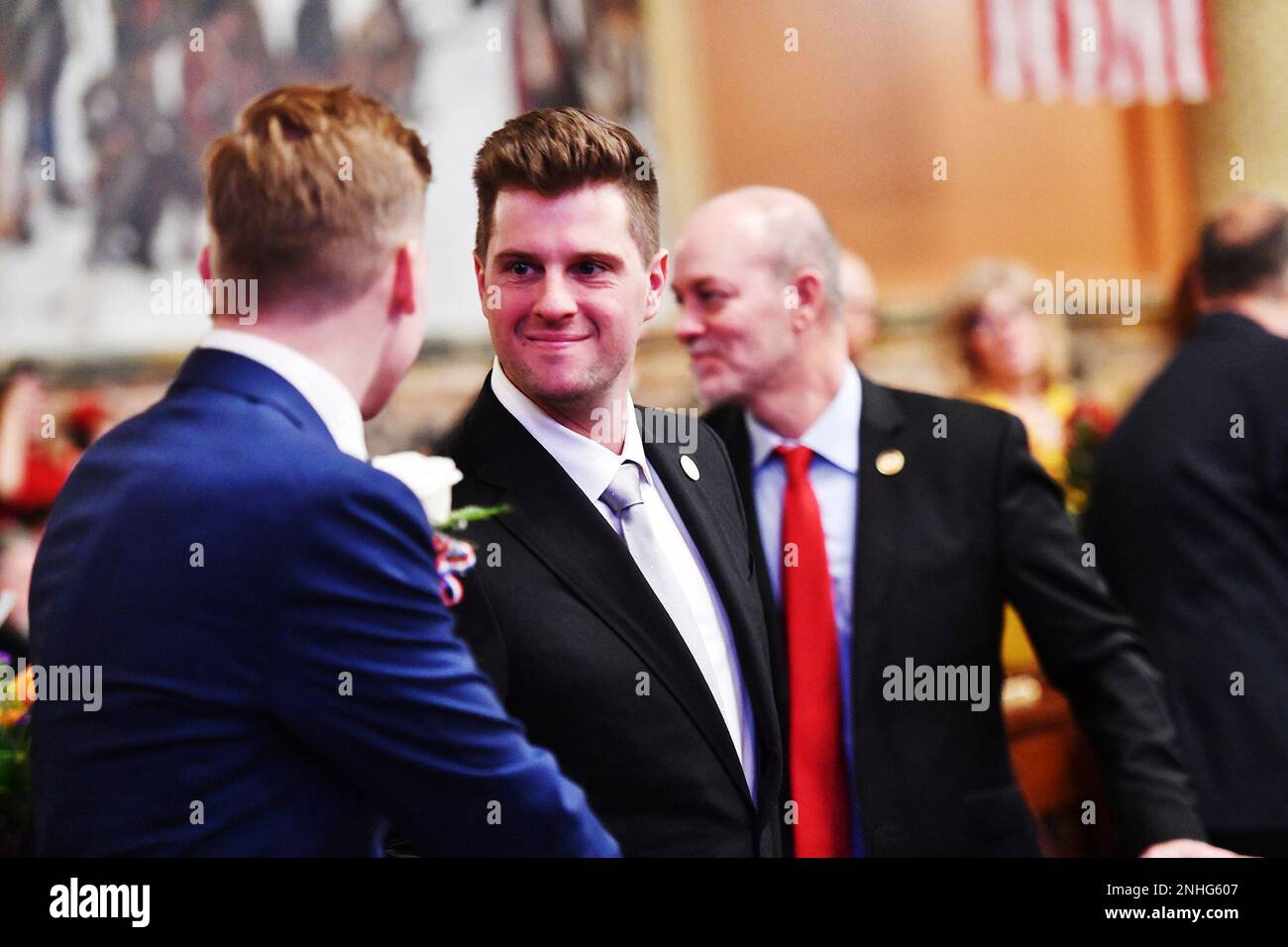 State Rep. Mike Cabell (R-117) shakes hands with State Rep. Alec ...