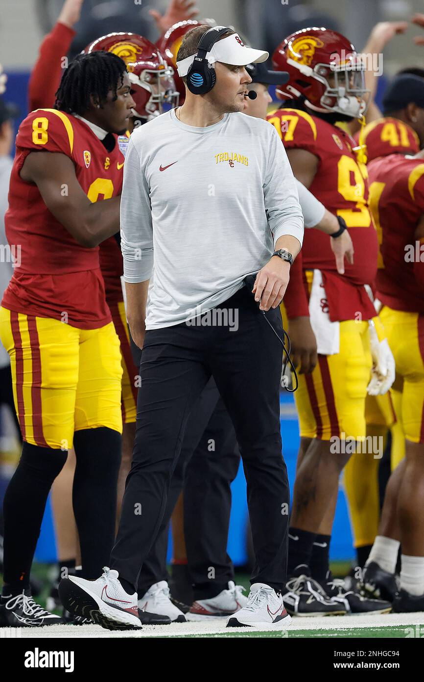 Southern California head coach Lincoln Riley looks back at a play ...