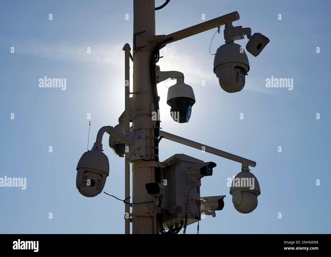 Monitoring cameras are installed on a utility pole during the New Year ...