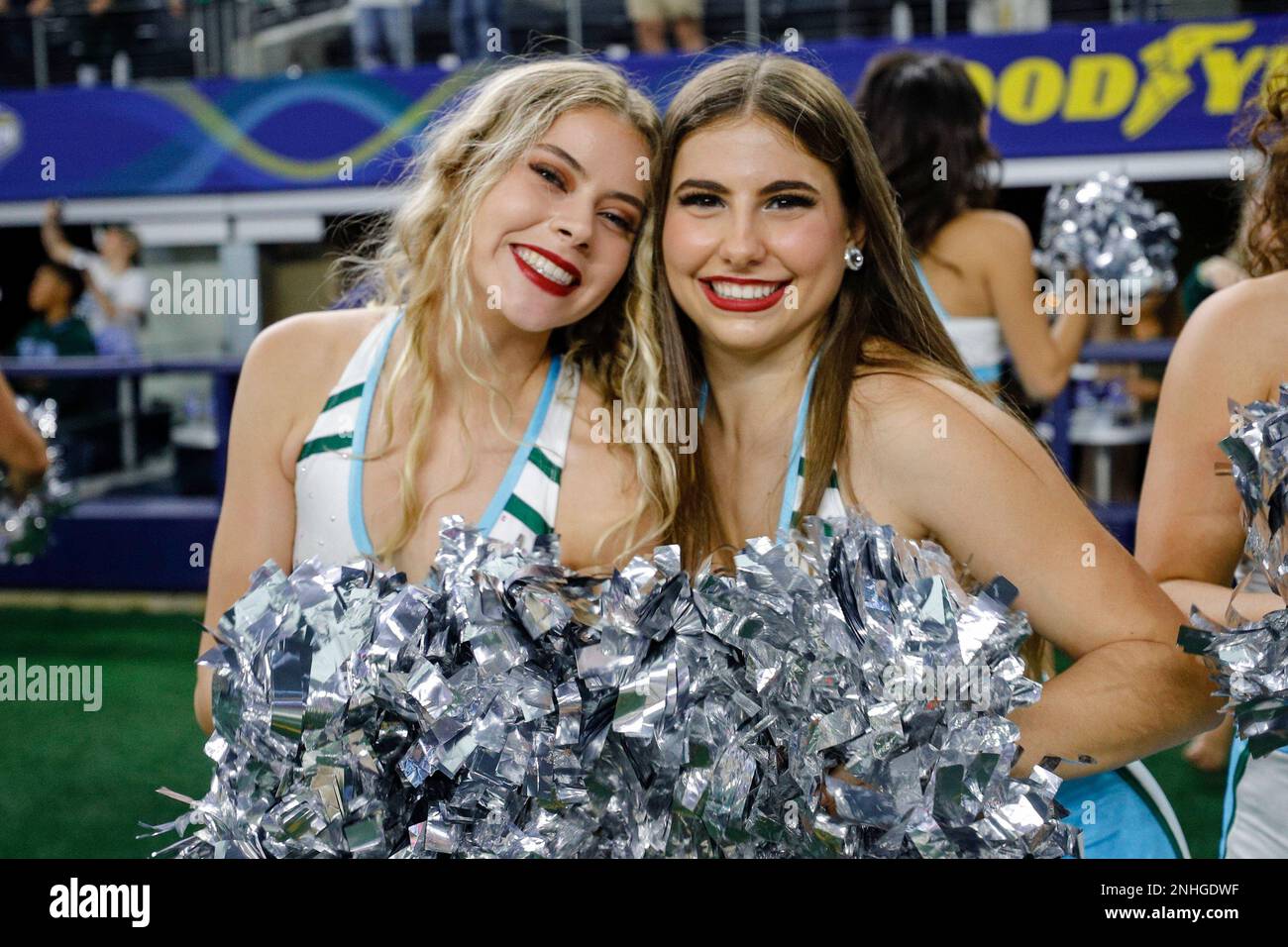 ARLINGTON, TX - JANUARY 02: Tulane Green Wave cheerleaders pose for a ...
