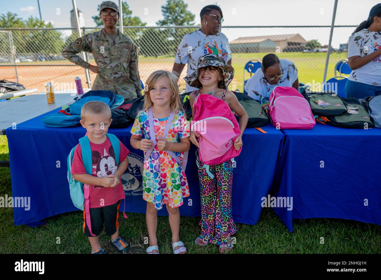 Military children receive school supplies during a Back to School Field ...