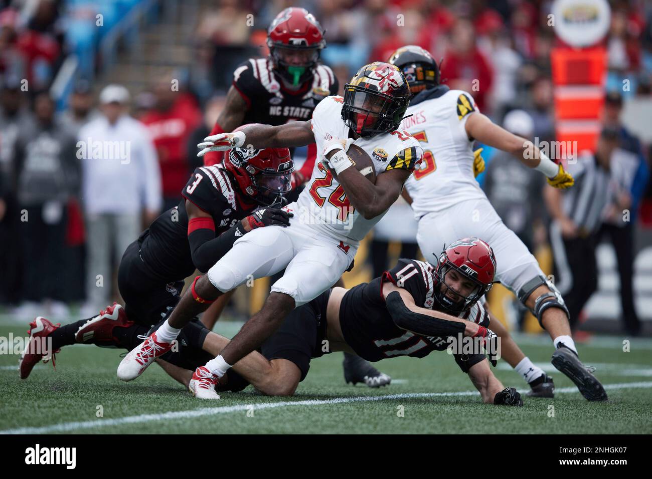 Maryland Terrapins running back Roman Hemby (24) is tripped up by North ...