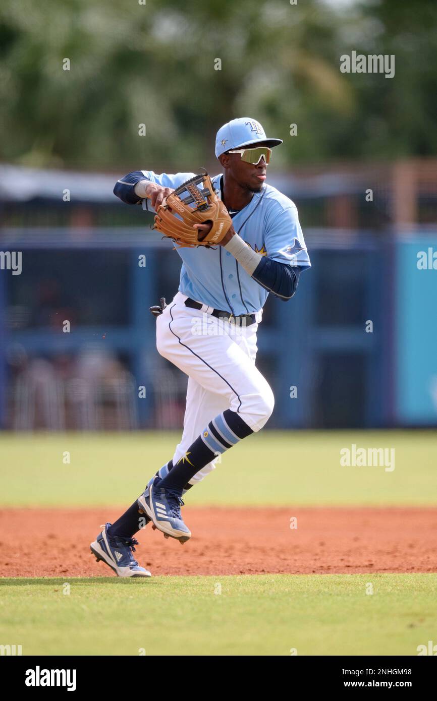 FCL Rays third baseman Alejandro Pie (64) throws to first base during a ...