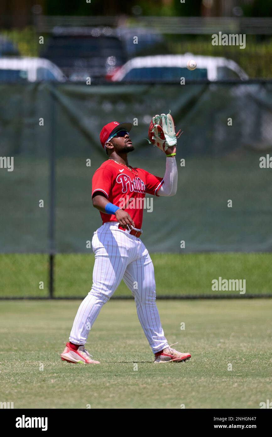 FCL Phillies outfielder Yemal Flores (12) catches a fly ball during a ...