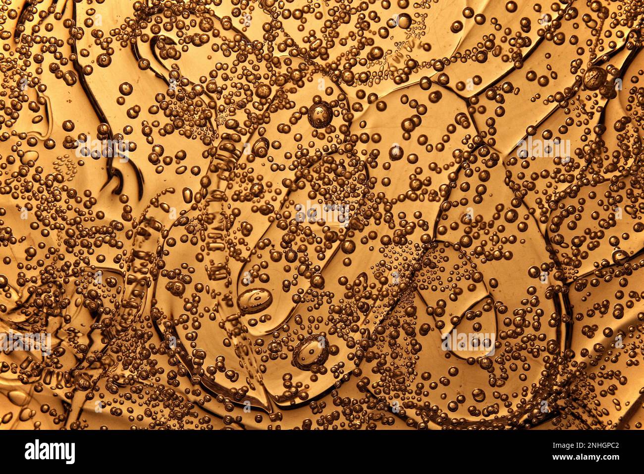 Close up view of air bubbles trapped in molten plexiglass Stock Photo ...