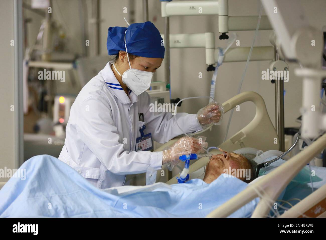 A doctor works in the ICU ward at a hospital in Suining in southwest ...