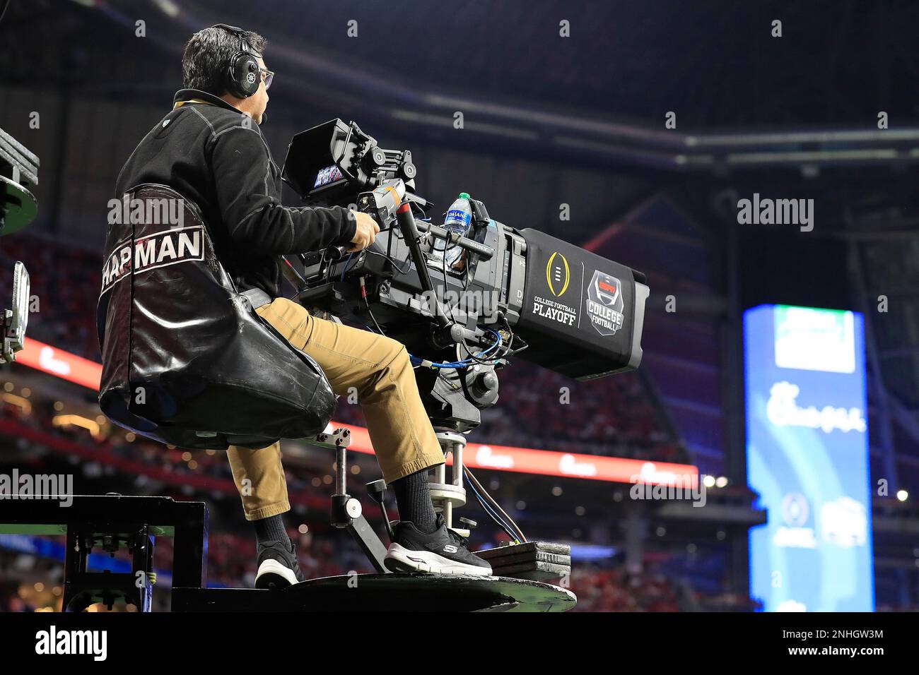 ATLANTA, GA - DECEMBER 31: An ESPN camera operator captures the action ...
