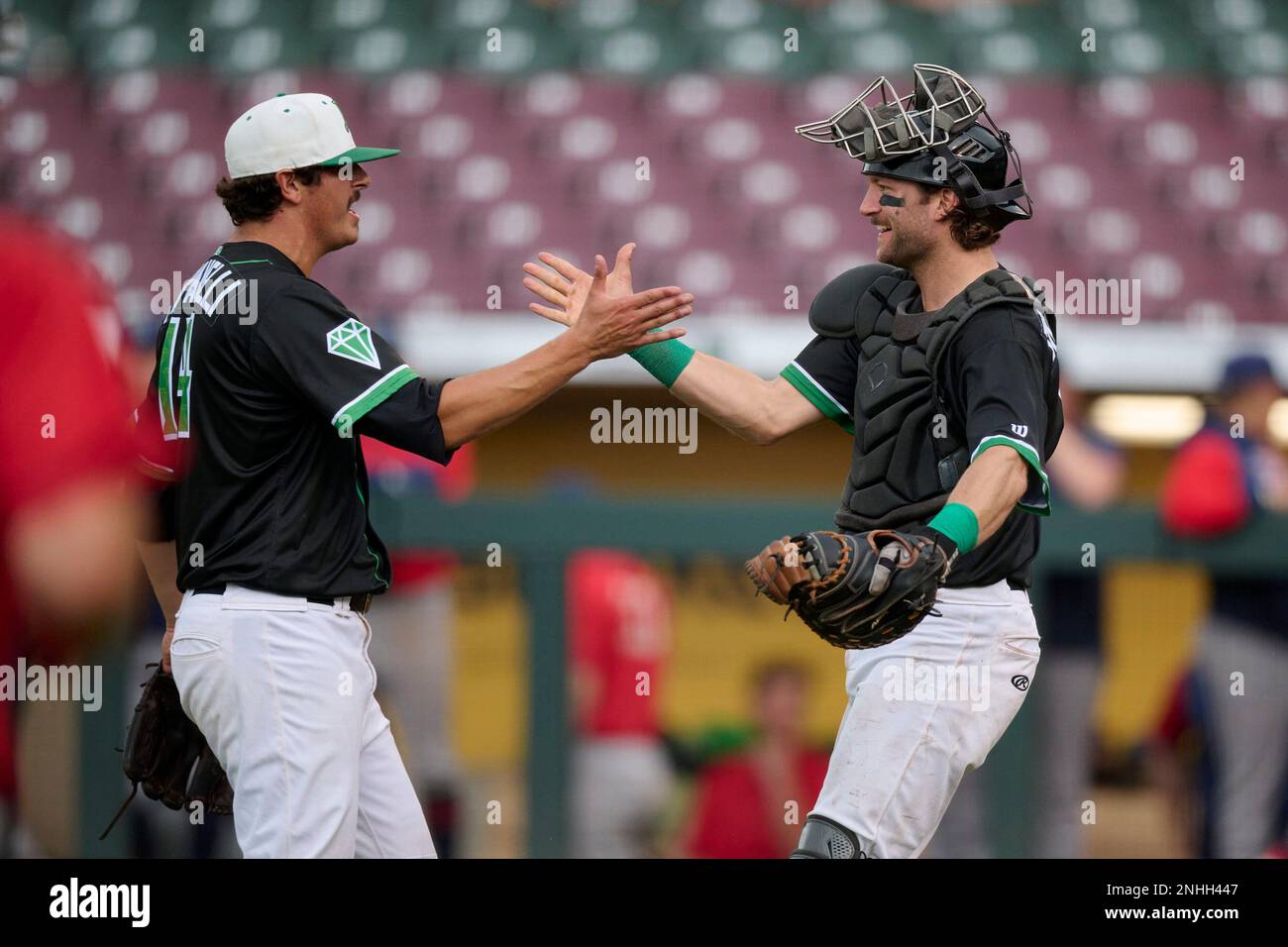 Dayton Dragons pitcher Vin Timpanelli (14) and catcher Michael ...