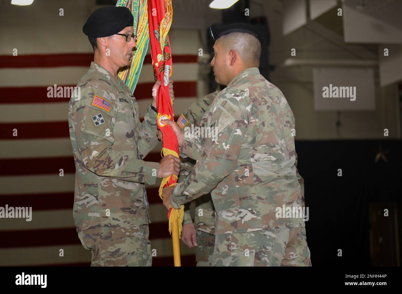 From left to right, Lt. Col. Adam Ropelewski, commander of 2nd Battalion, 77th Field Artillery ...