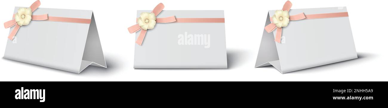 Three white cardboard place cards decorated with pink bow and flower ...
