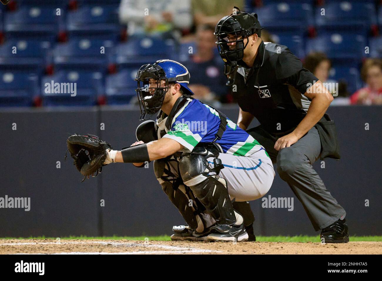 Umpire Gabriel Alfonso and Hartford Yard Goats catcher Daniel Cope (12 ...