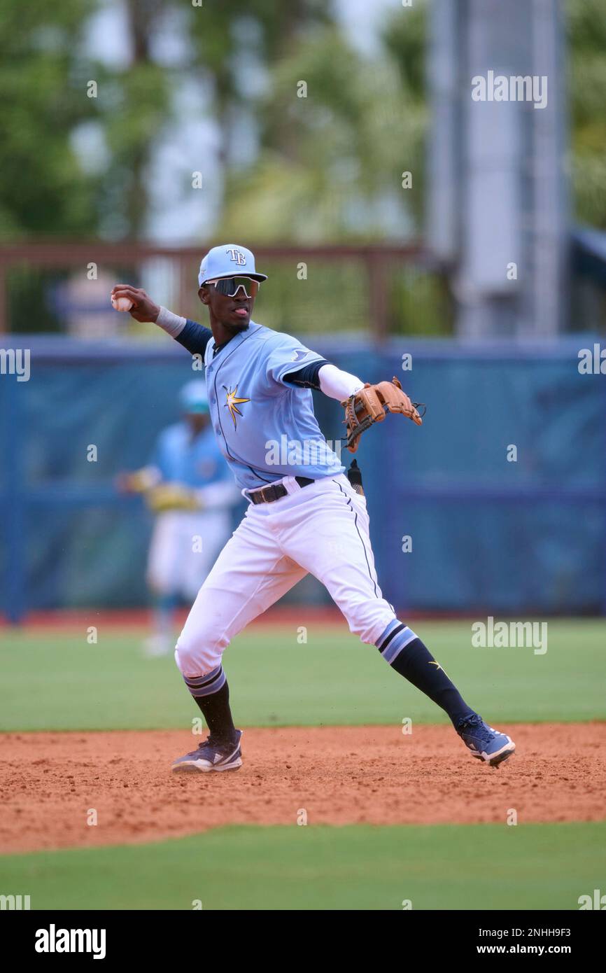 FCL Rays third baseman Alejandro Pie (64) throws to first base during a ...