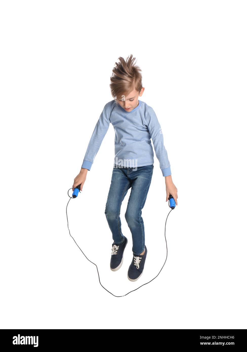 Cute little boy with jump rope on white background Stock Photo - Alamy