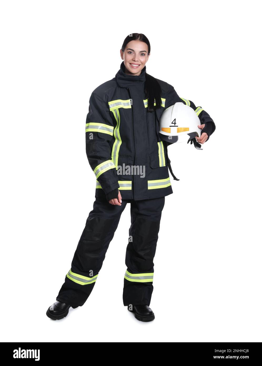 Full length portrait of firefighter in uniform with helmet on white ...