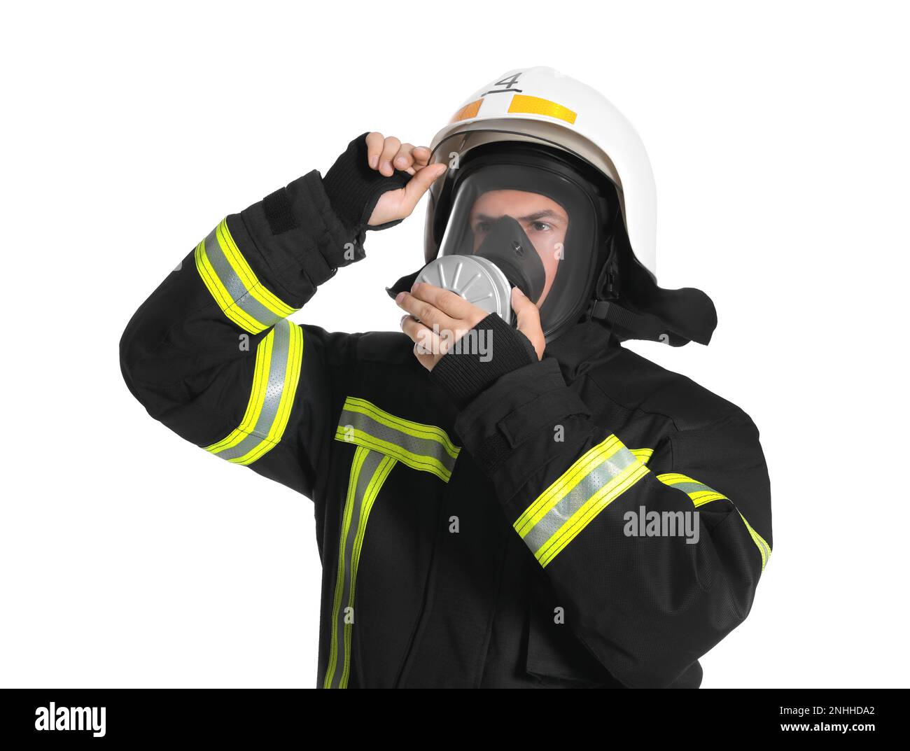 Portrait of firefighter in uniform, helmet and gas mask on white ...