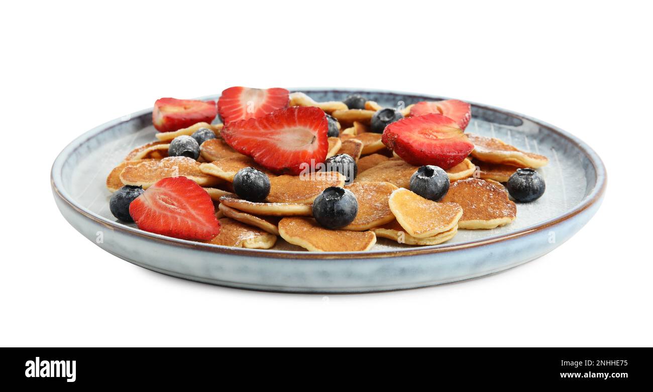 Mini pancakes on white Cut Out Stock Images & Pictures - Alamy