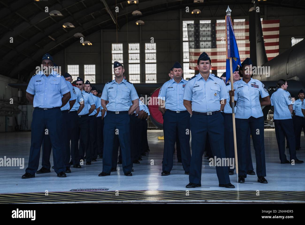 Airmen assigned to the 6th Operations Group stand in formation during ...