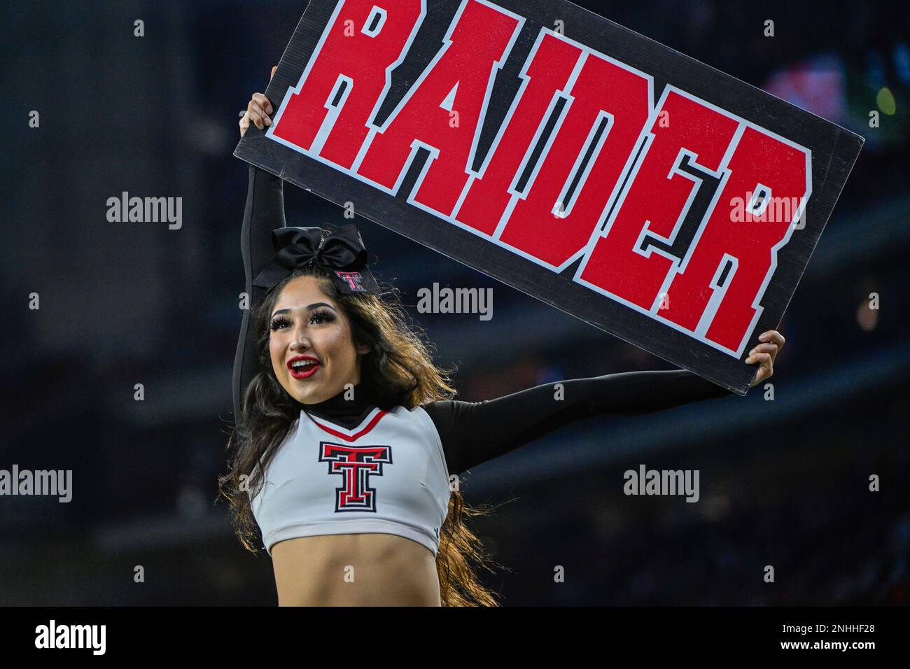 HOUSTON, TX - DECEMBER 28: Red Raider cheerleaders rev up the crowd ...