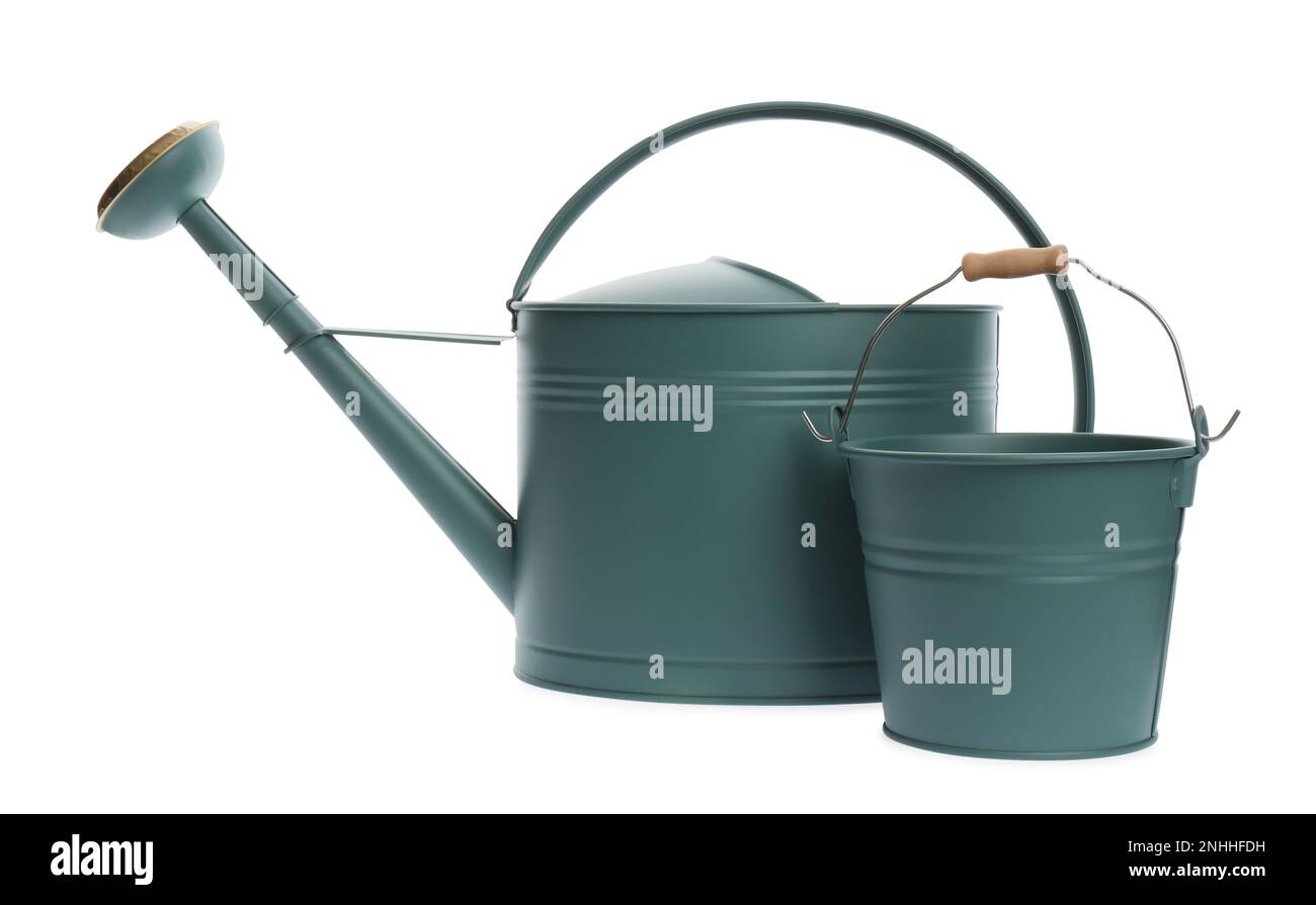 Watering can and bucket on white background Stock Photo - Alamy