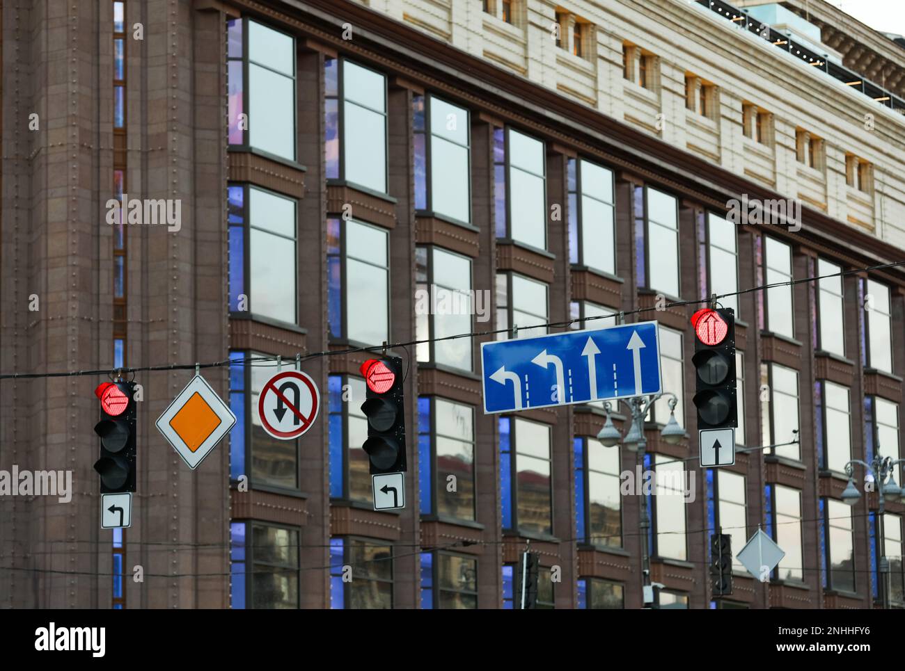 View of traffic lights and road signs in city Stock Photo - Alamy