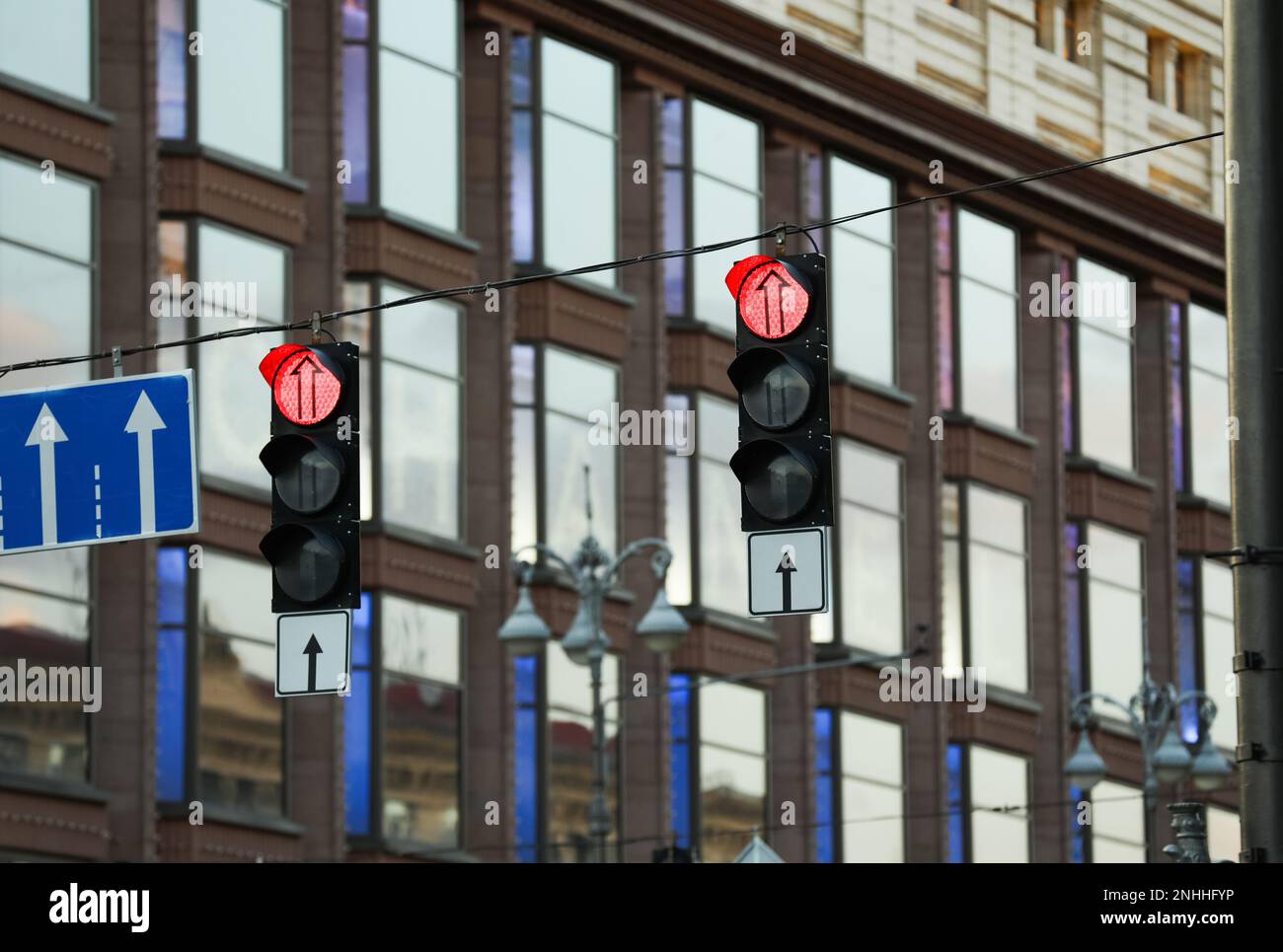 View of traffic lights and road signs in city Stock Photo - Alamy