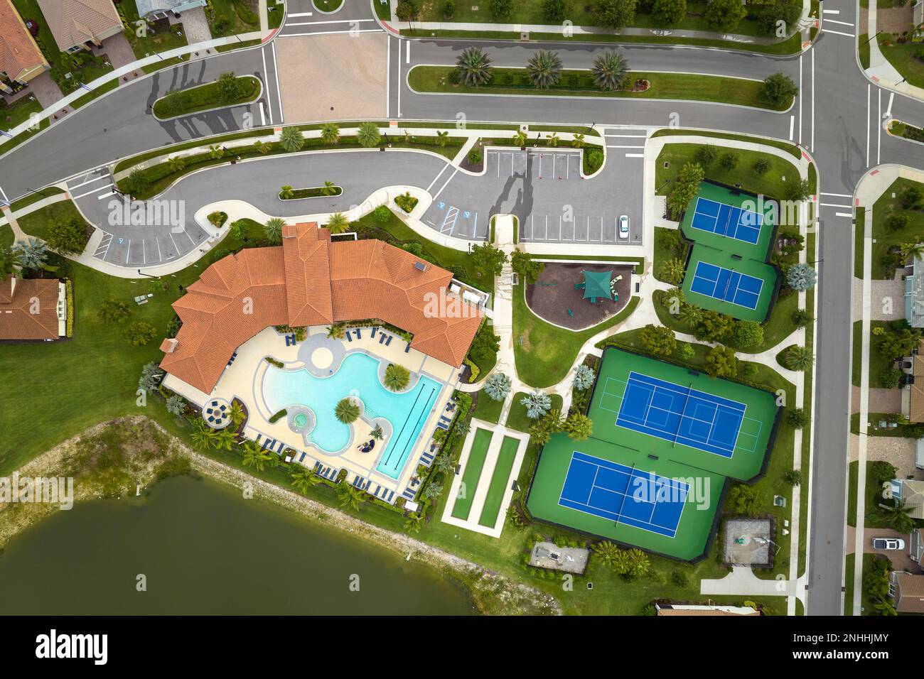 Aerial view of blue tennis courts for sports recreational activity ...