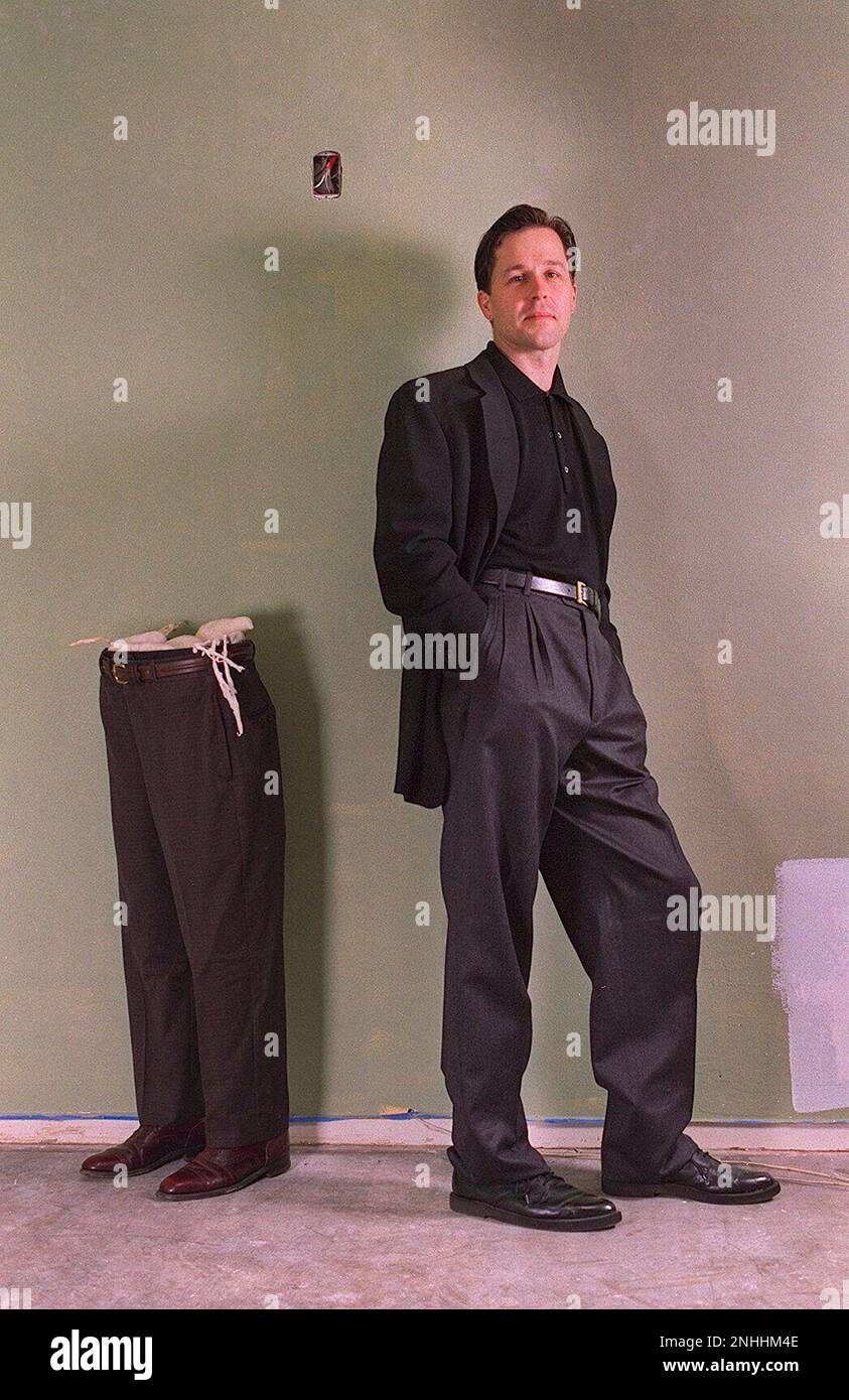 BLACK SUIT 2/C/19SEP96/DD/MACOR Artist Ray Beldner models a Black Suit ...