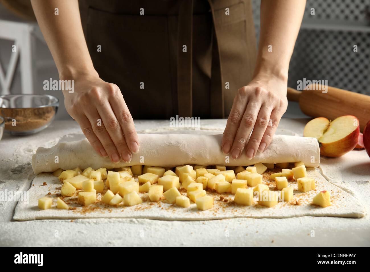 Woman making delicious apple strudel hi-res stock photography and ...