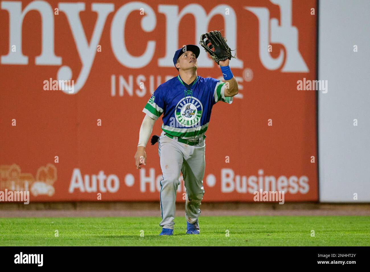 Hartford Yard Goats second baseman Isaac Collins (4) catches a fly ball ...