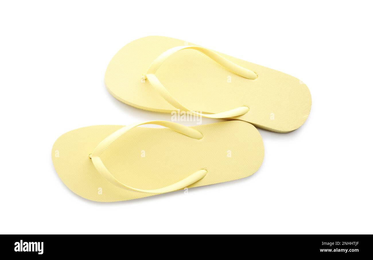 Stylish yellow flip flops on white background, top view Stock Photo - Alamy
